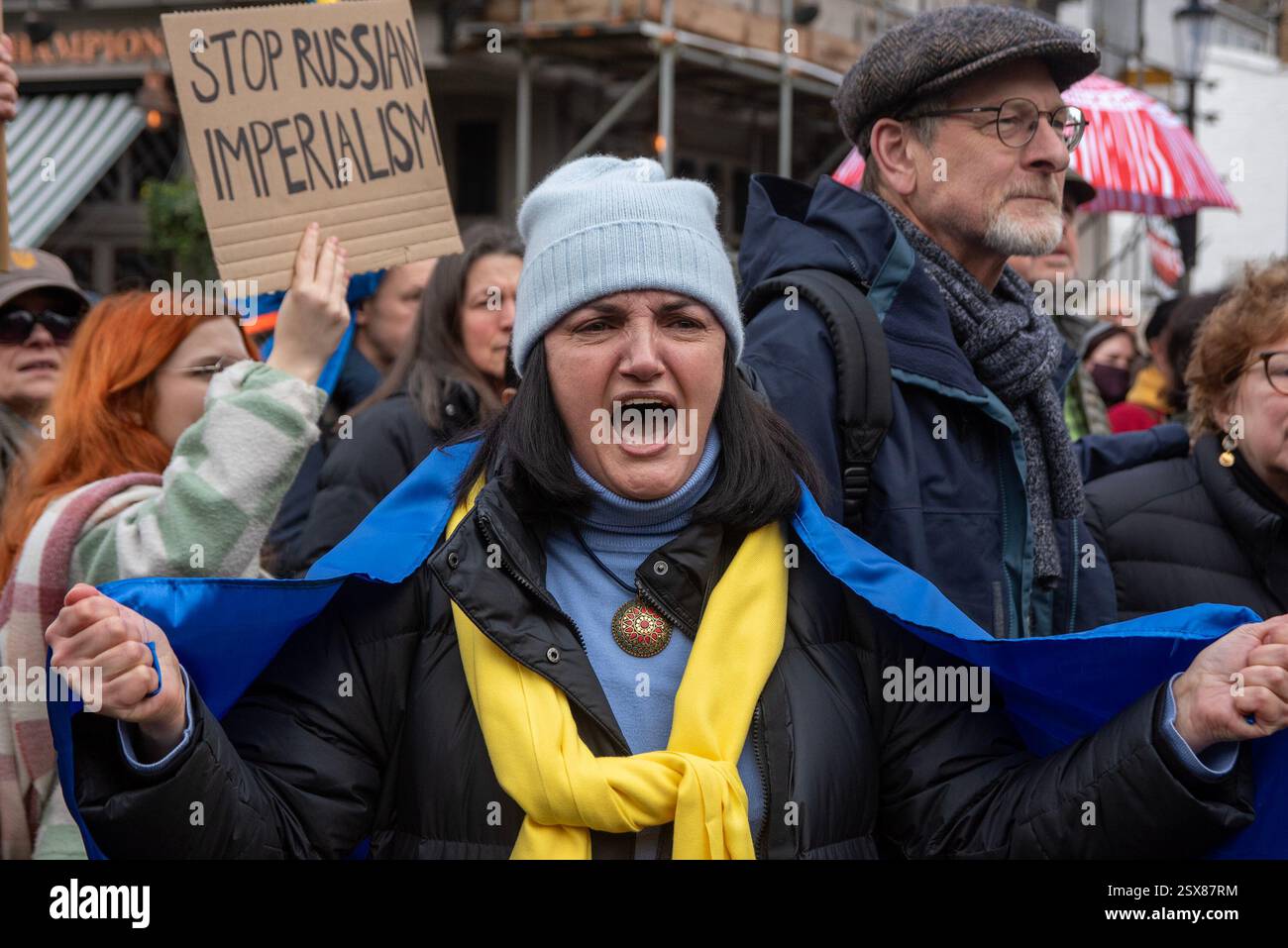 London, UK. 22nd Feb, 2025. A female protester chant slogans during the ...