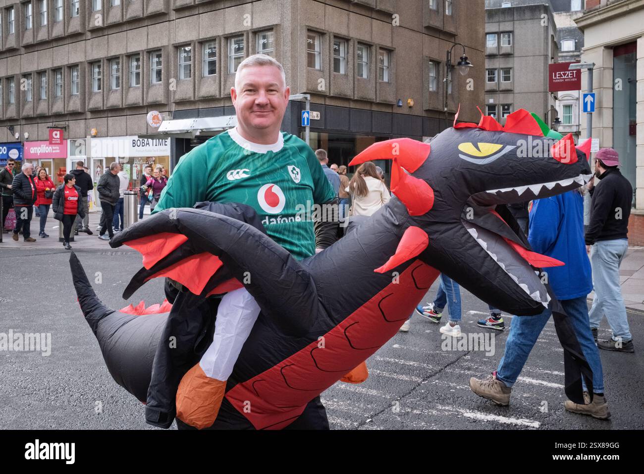 Irish rugby fan in costume in Cardiff city centre ahead of the match ...