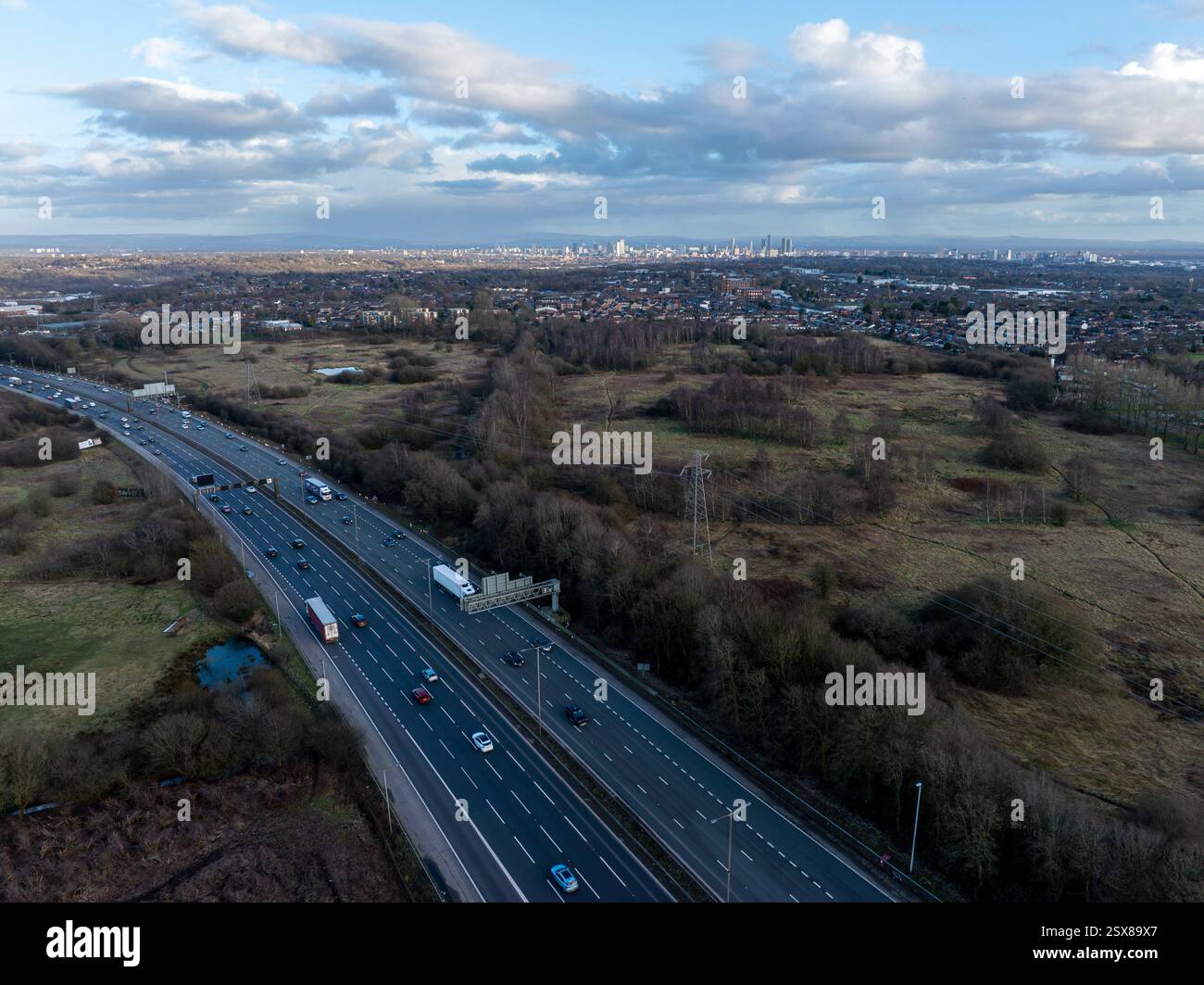 Aerial image of Manchester M60 outer ring road motorway with Manchester ...