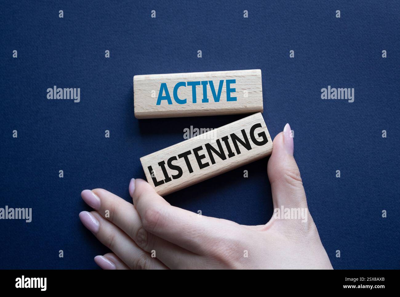 Active listening symbol. Wooden blocks with words Active listening ...
