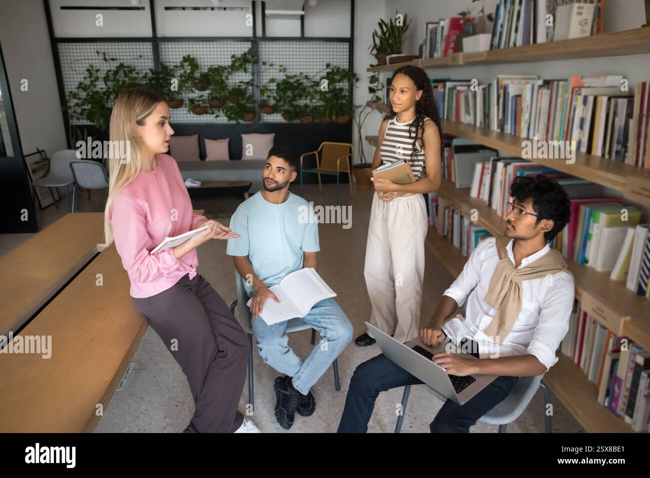 Multiethnic classmates meeting college campus hi-res stock photography ...