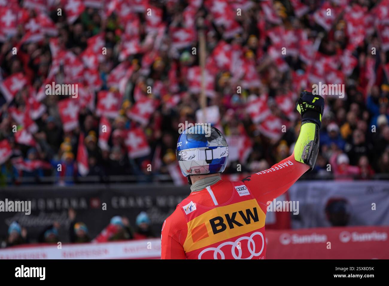 Switzerland's Marco Odermatt waves to fans after completing an alpine ...