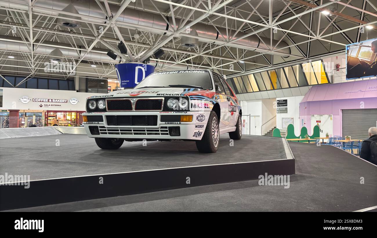 Classic Lancia Delta rally car on display in Turin Airport Stock Photo ...