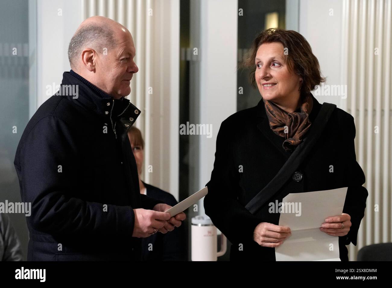 German Chancellor Olaf Scholz arrives with his wife Britta Ernst to ...