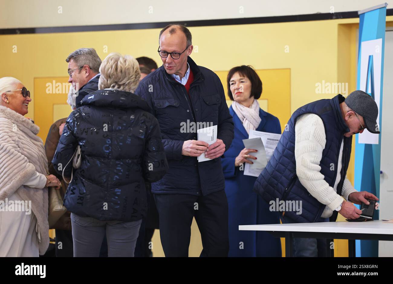 Arnsberg, Germany. 23rd Feb, 2025. Friedrich Merz (CDU, center), party ...