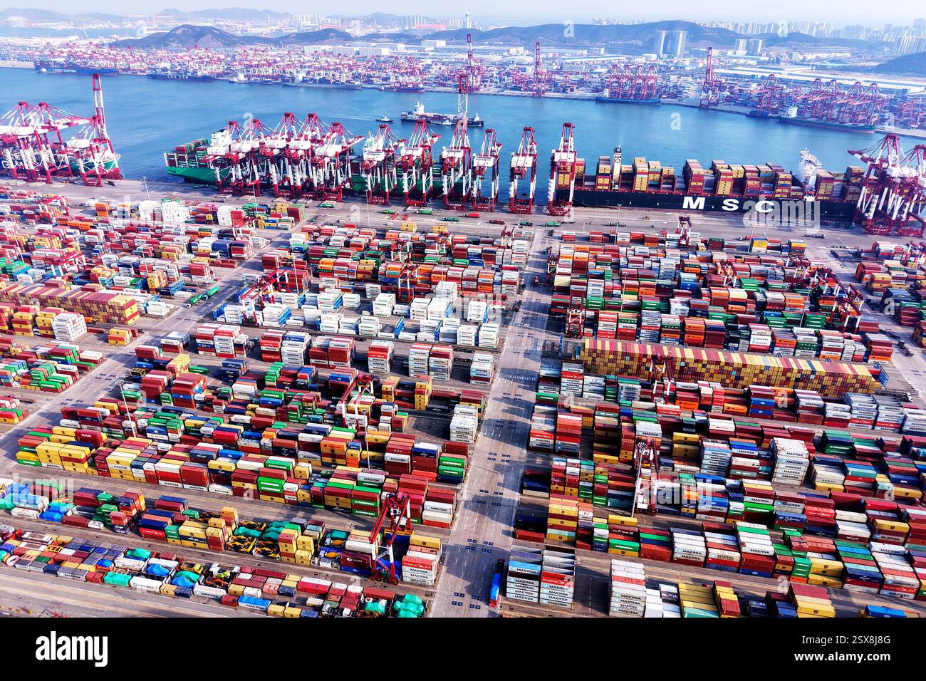QINGDAO, CHINA - FEBRUARY 23, 2025 - A busy container terminal for ...