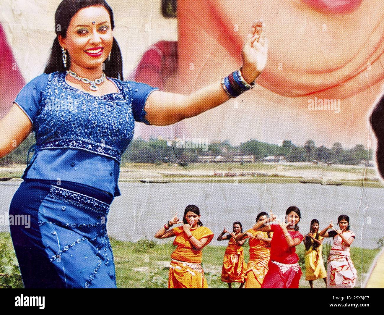 Colourful dance sequence depicted on the Seema Rekha poster, showcasing ...