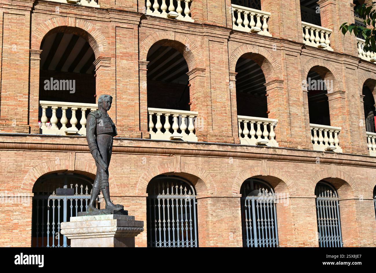 Statue of a bullfighter matador in front of the bullfight arena in ...