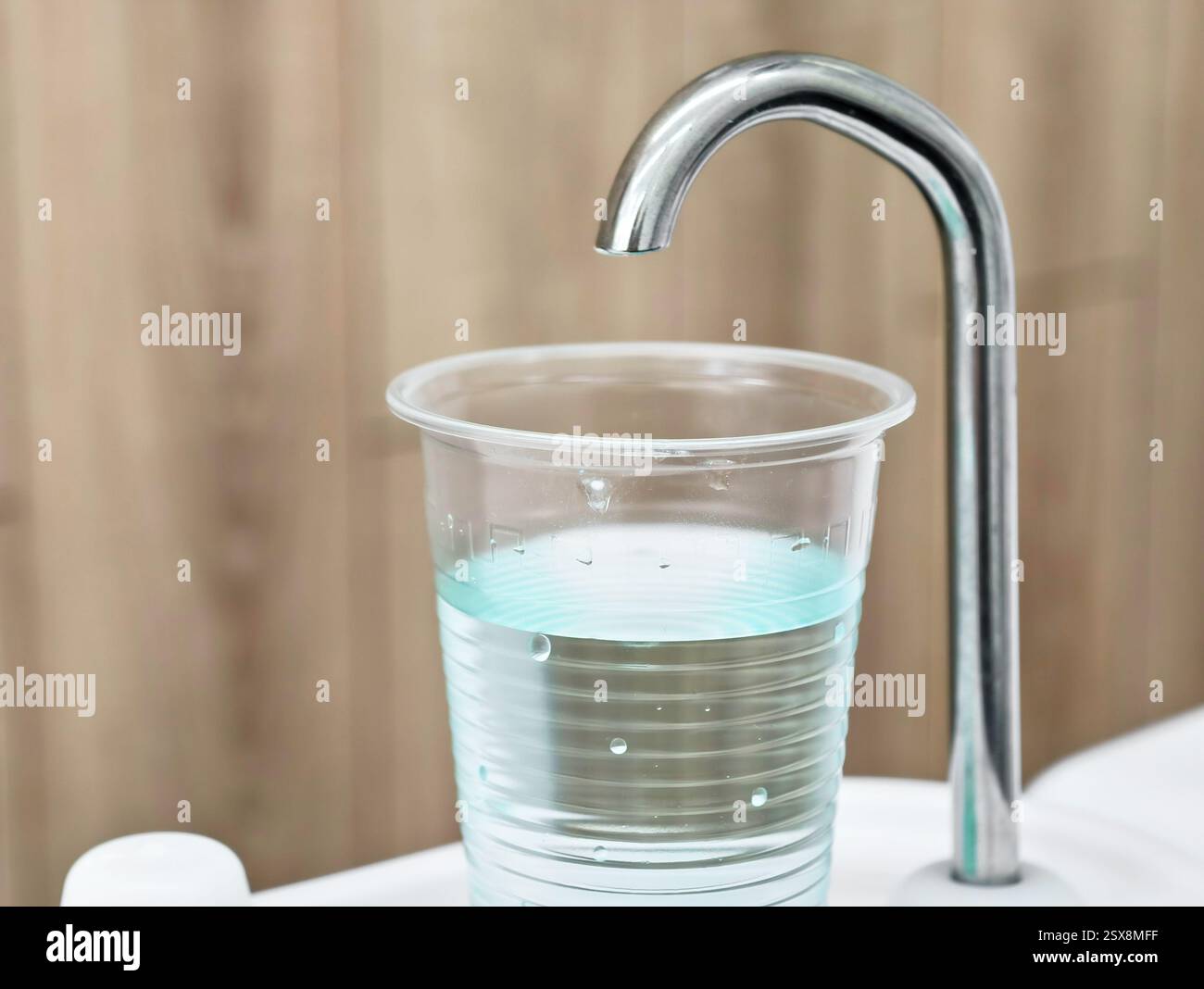 Water station for dental procedures featuring clean, accessible ...