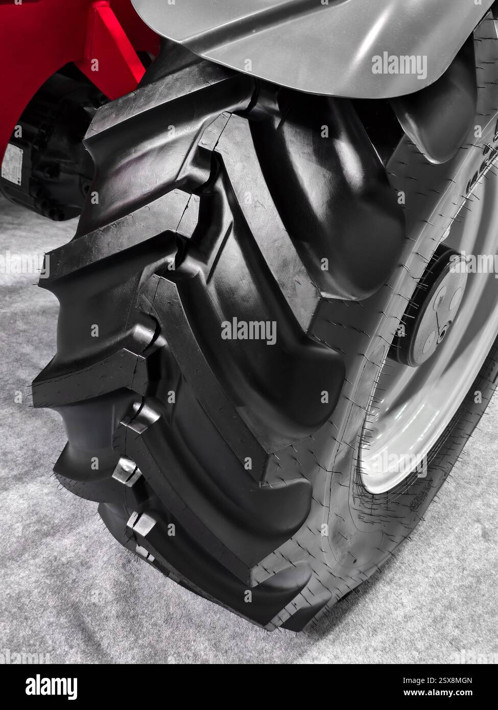 Massive agricultural machinery wheel showcasing robust design and ...
