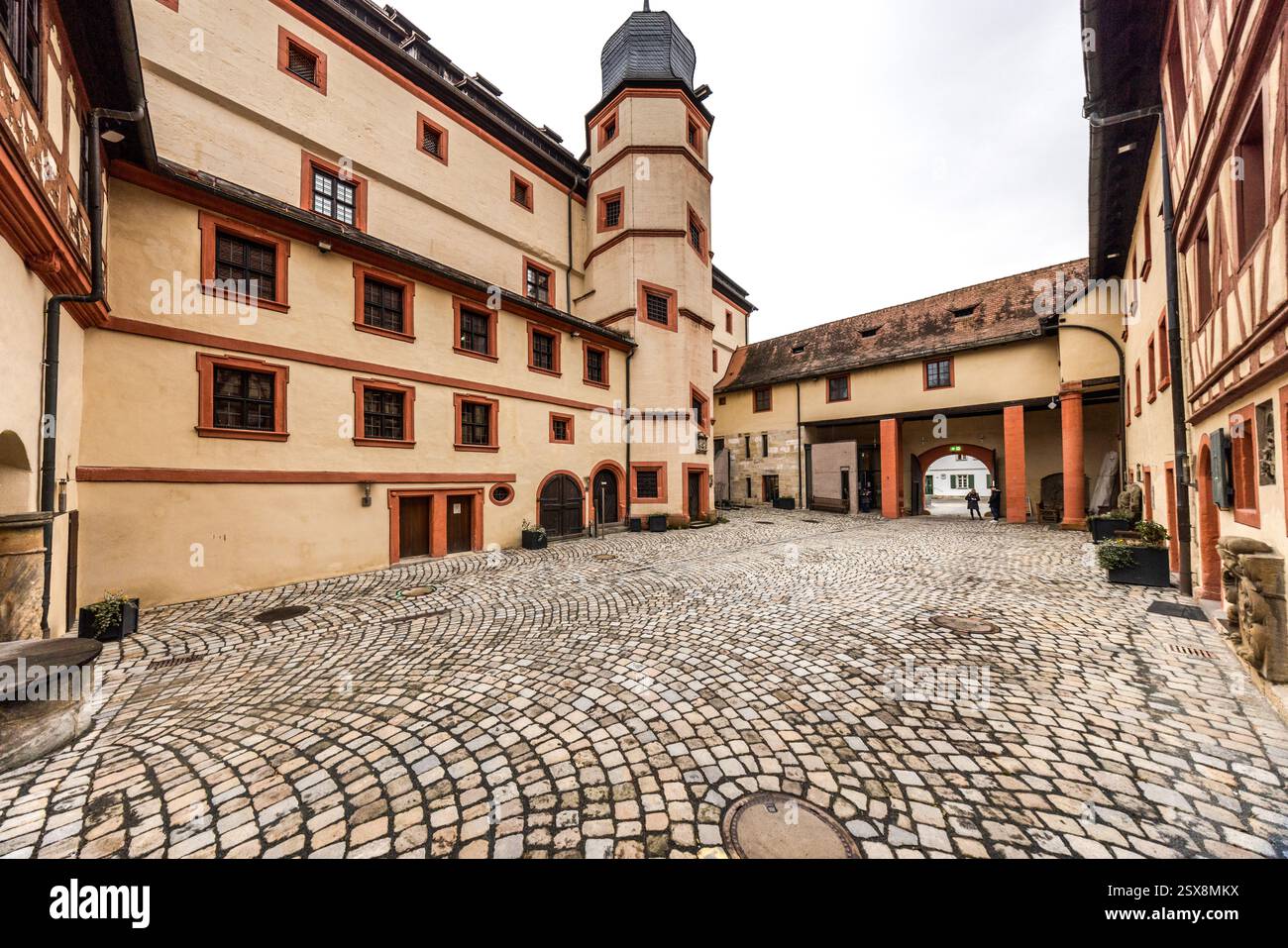 Kaiserpfalz (Imperial Palace) in Forchheim shows a a paved courtyard ...