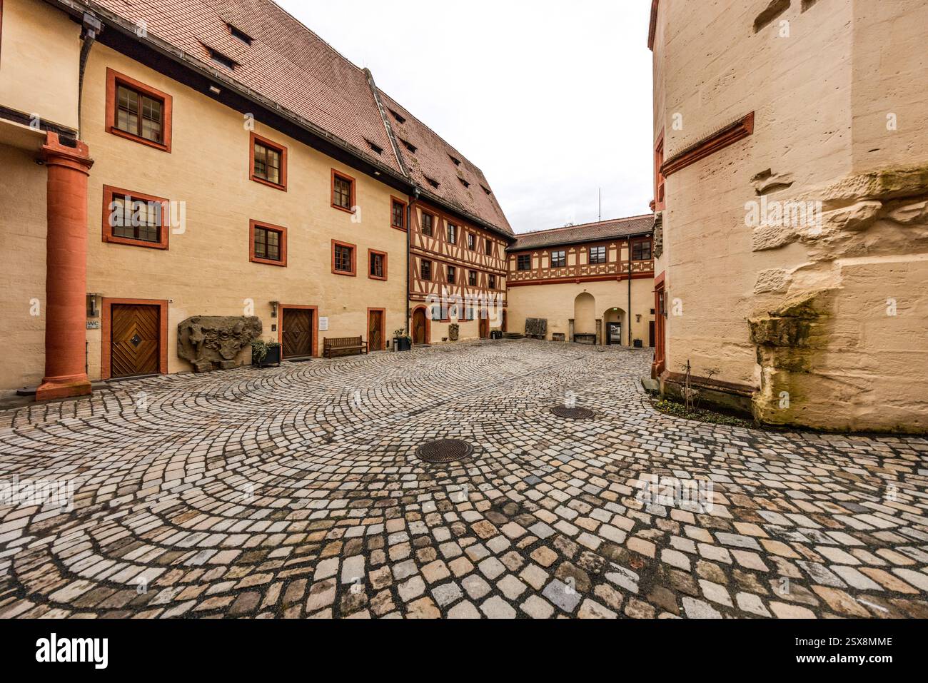 Kaiserpfalz (Imperial Palace) in Forchheim shows a a paved courtyard ...