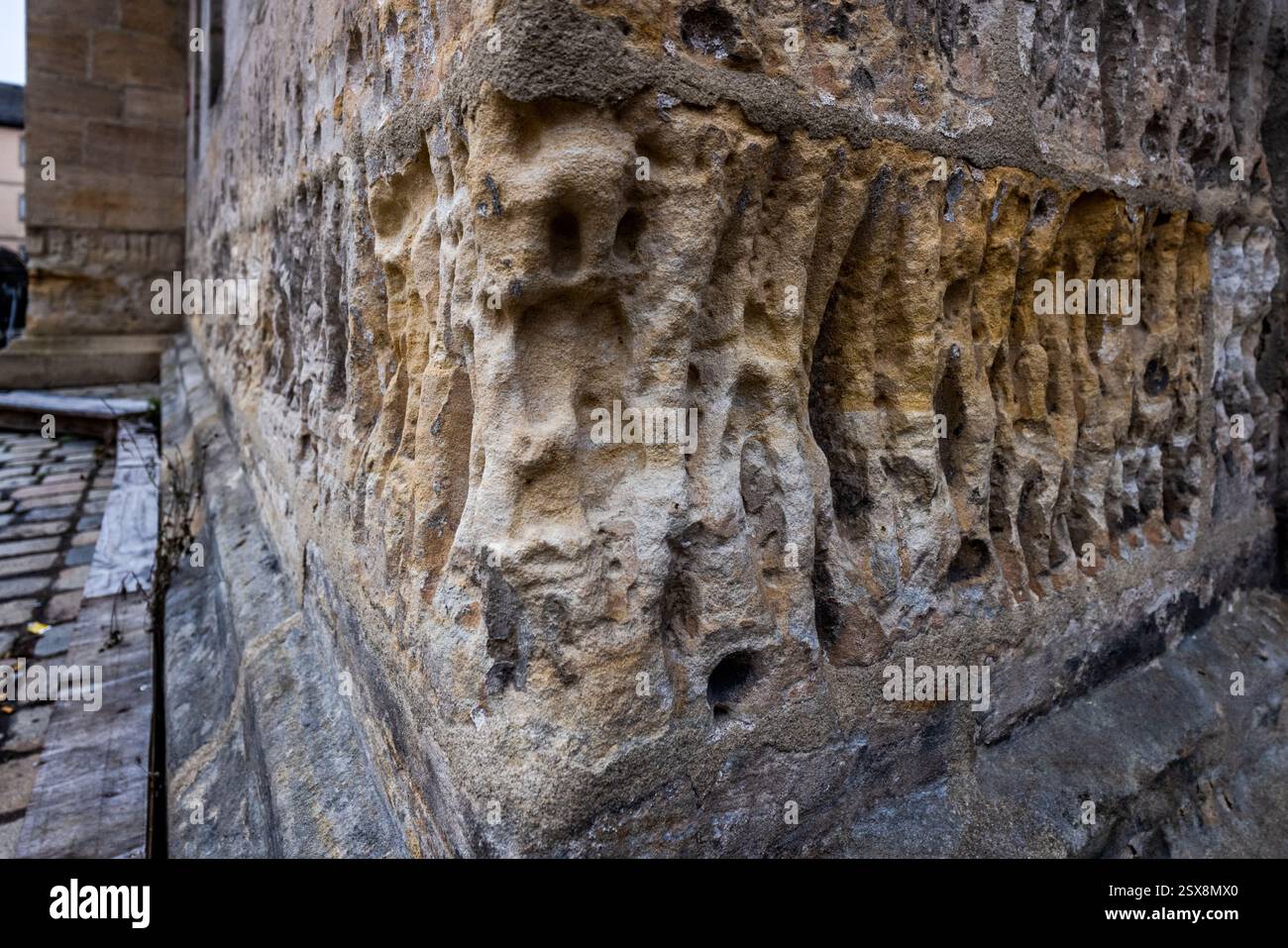 Close-up of the textured stone wall of the St. Martin Church in ...