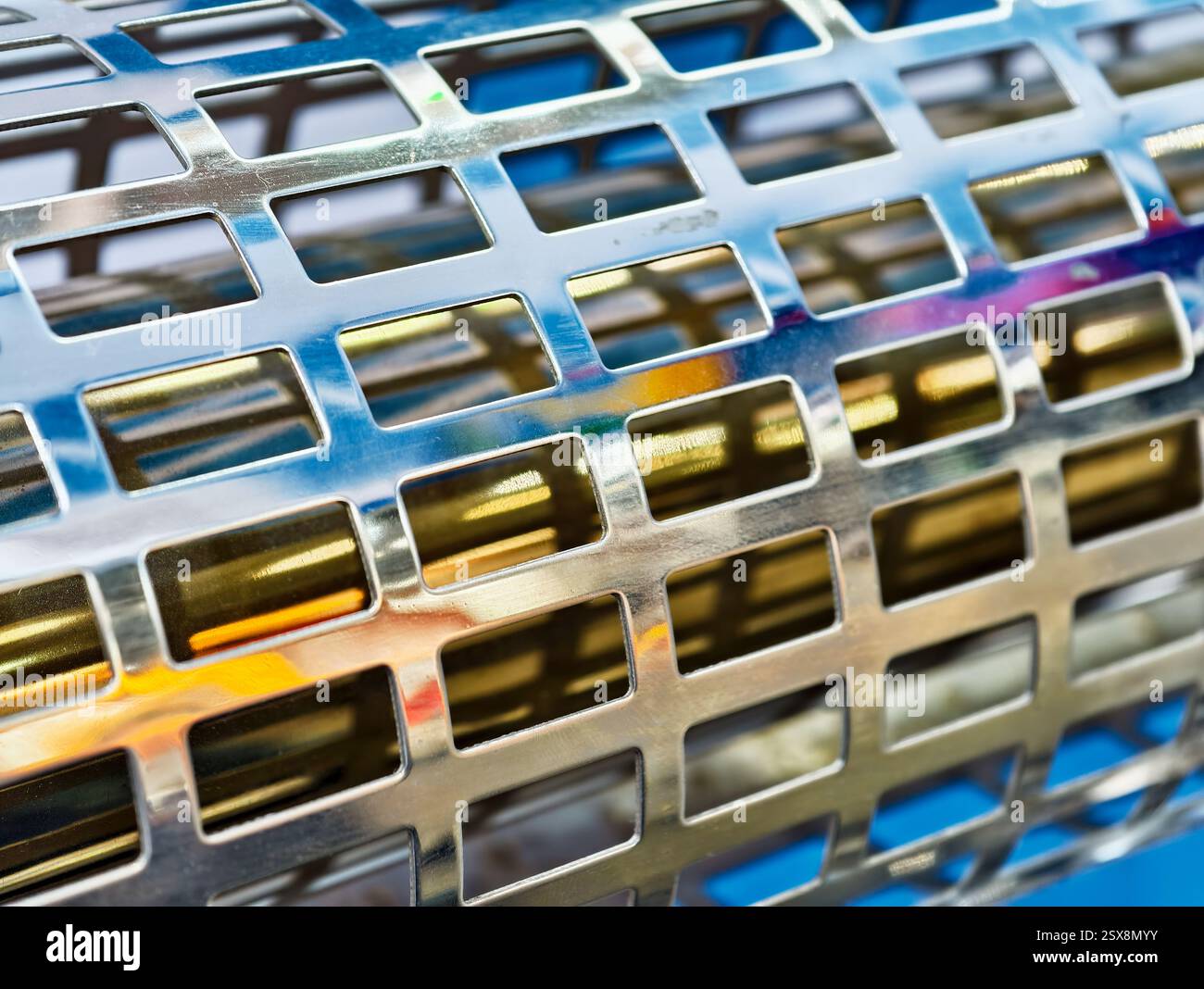 Shimmering metallic patterns reveal intricate designs and reflections ...