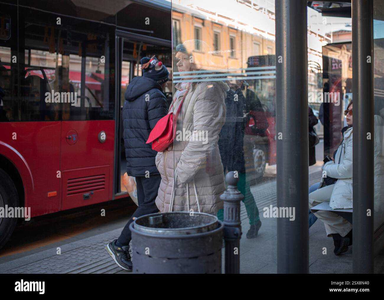 People at the city bus stop Stock Photo - Alamy