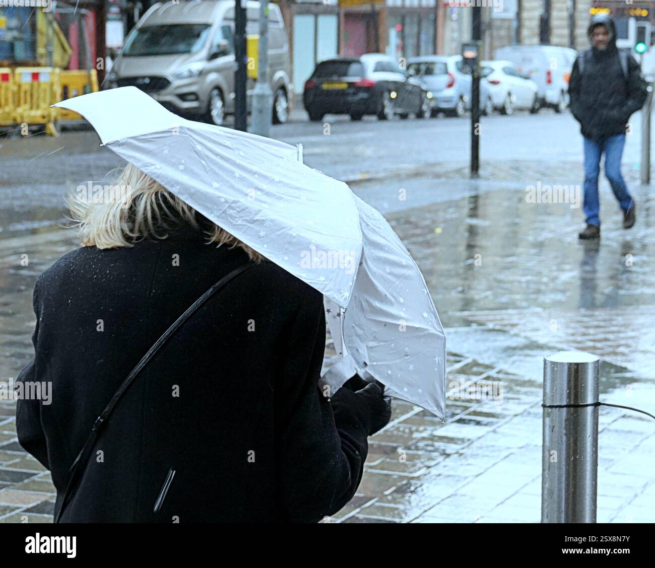 Glasgow, Scotland, UK. 23rd February, 2025. UK Weather: Cold and wet ...