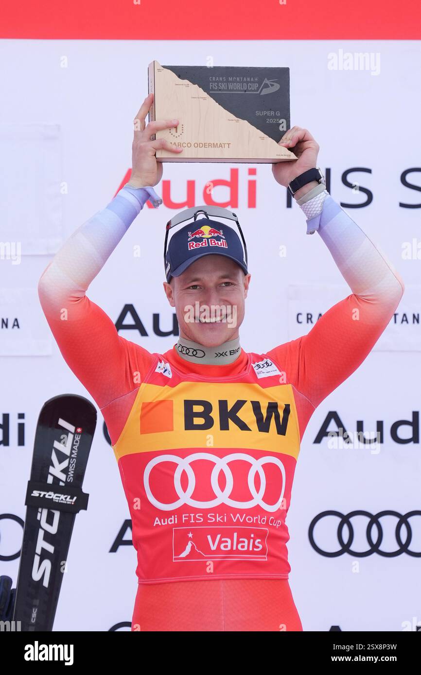 The winner Switzerland's Marco Odermatt celebrates after an alpine ski ...