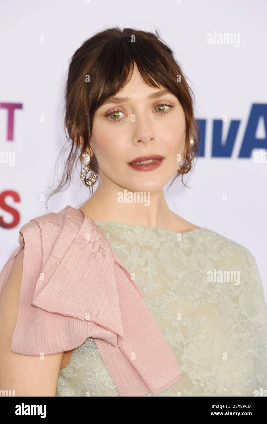 SANTA MONICA, CALIFORNIA - FEBRUARY 22: Elizabeth Olsen attends the ...