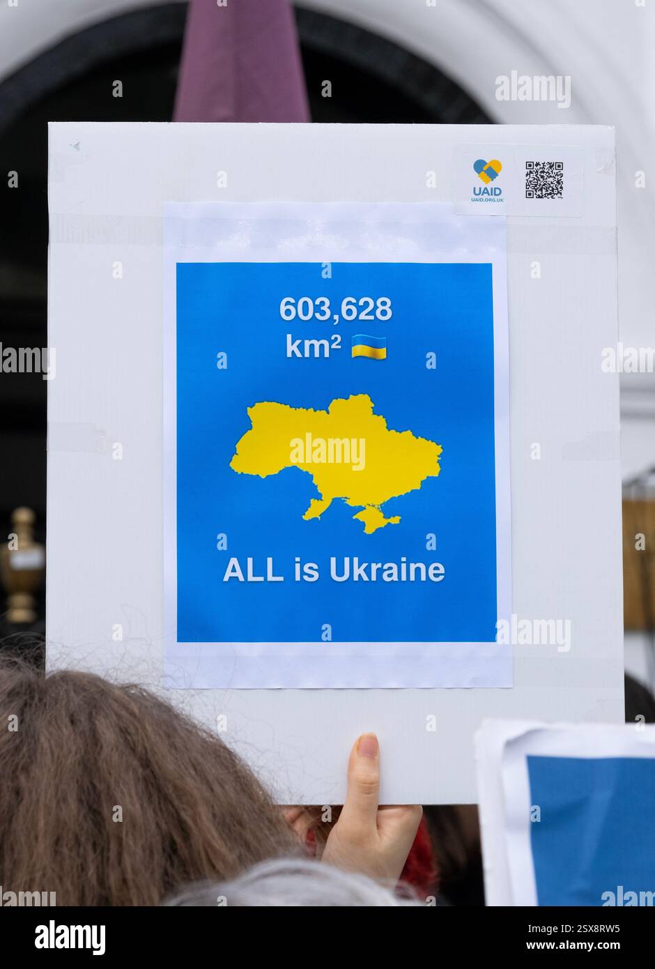 London, UK. 22nd February 2025. Protester holding sign at the RUSSIAN ...