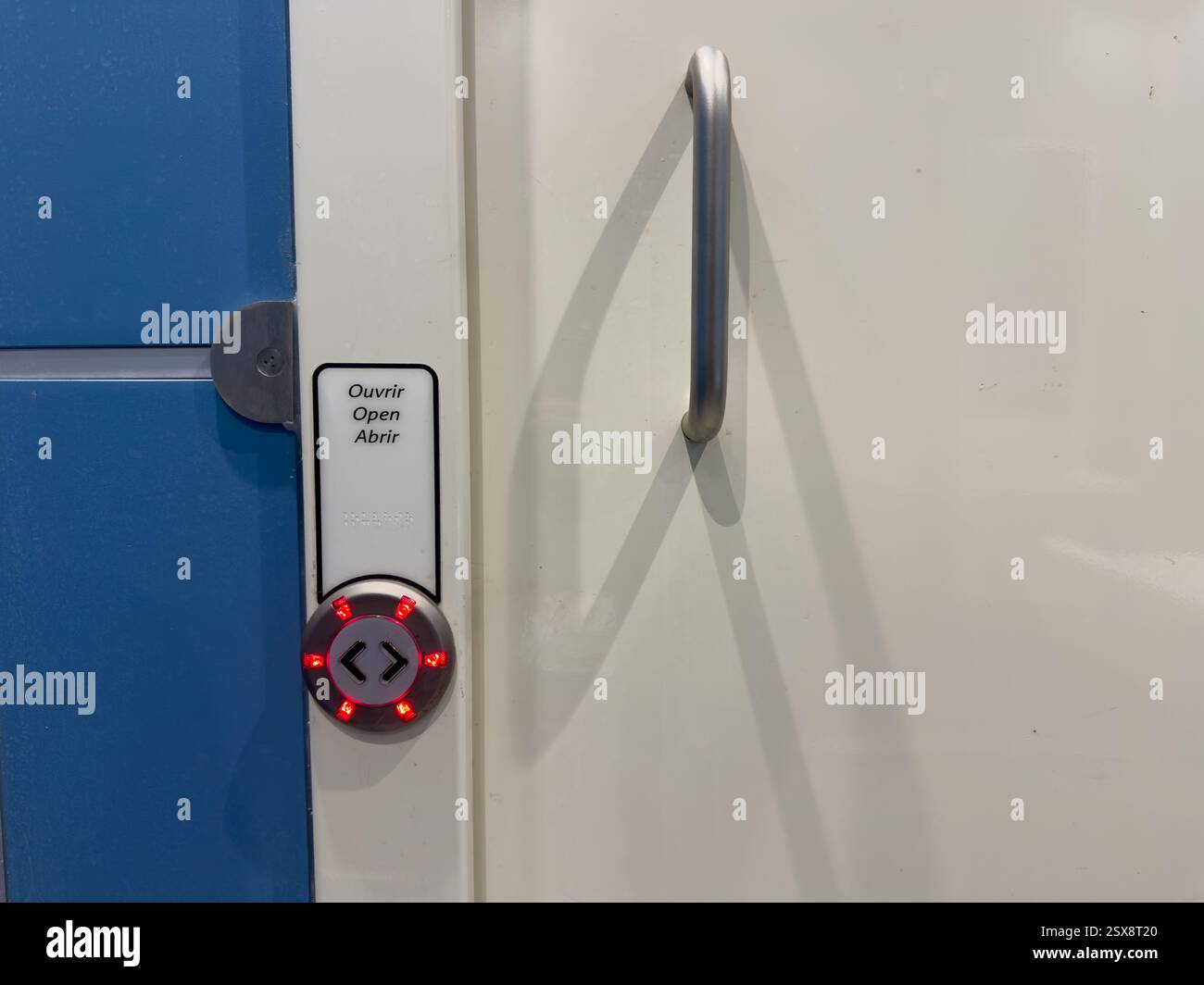 Door control panel in modern facility with illuminated button ...