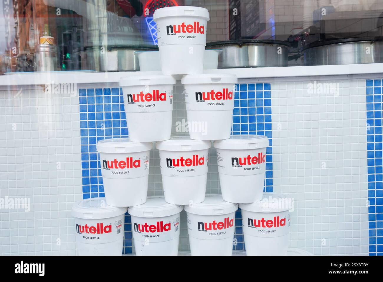 Stacks of Nutella buckets in a cafe window - Ireland, Dublin, 17.03. ...