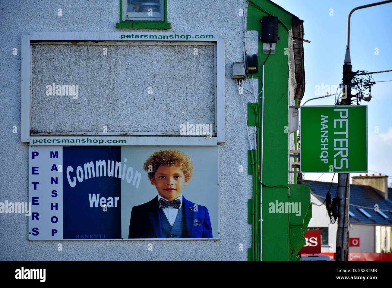 Communion Wear advertisement in Donegal Town, Ireland Stock Photo - Alamy
