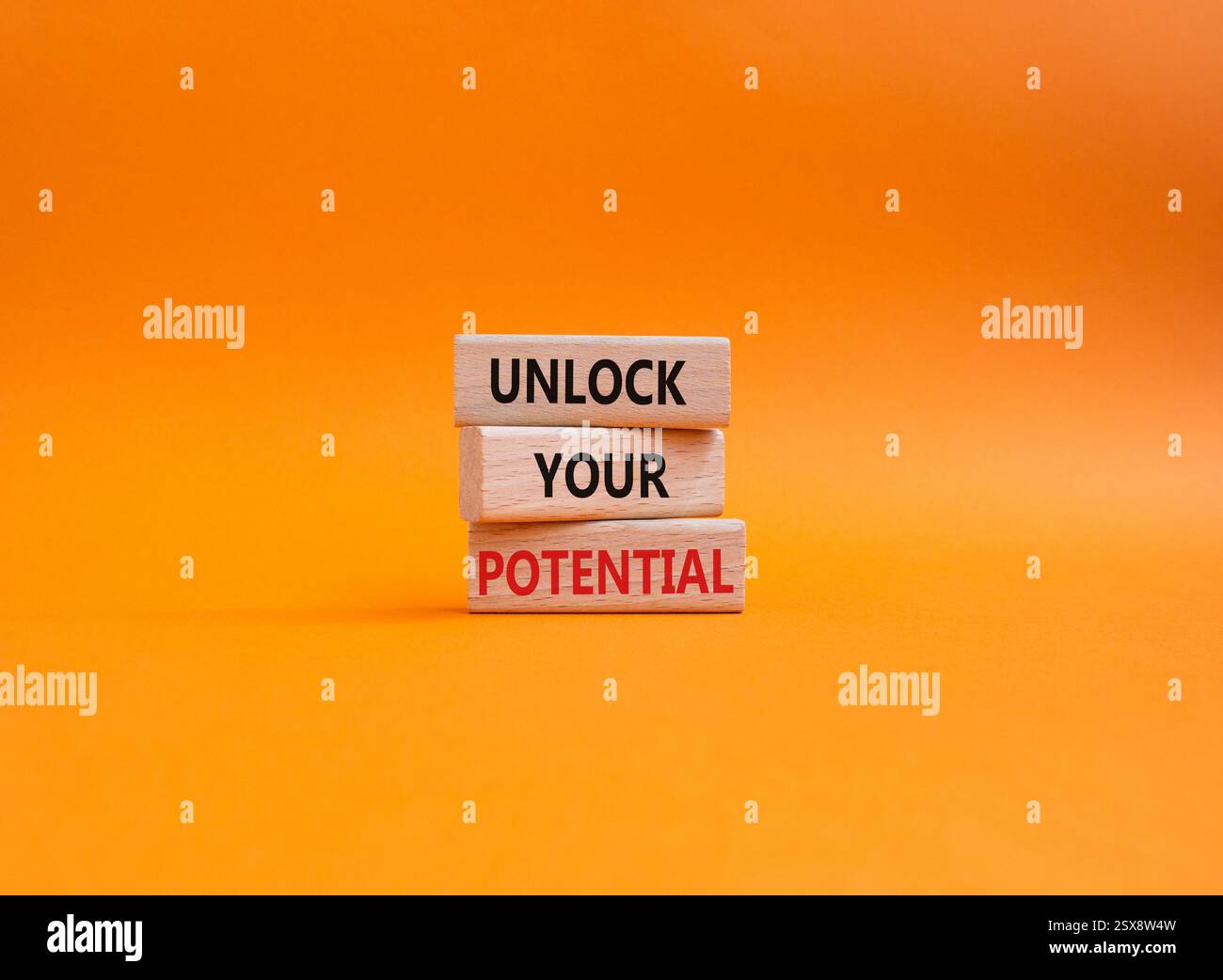Unlock your Potential symbol. Wooden blocks with words Unlock your ...