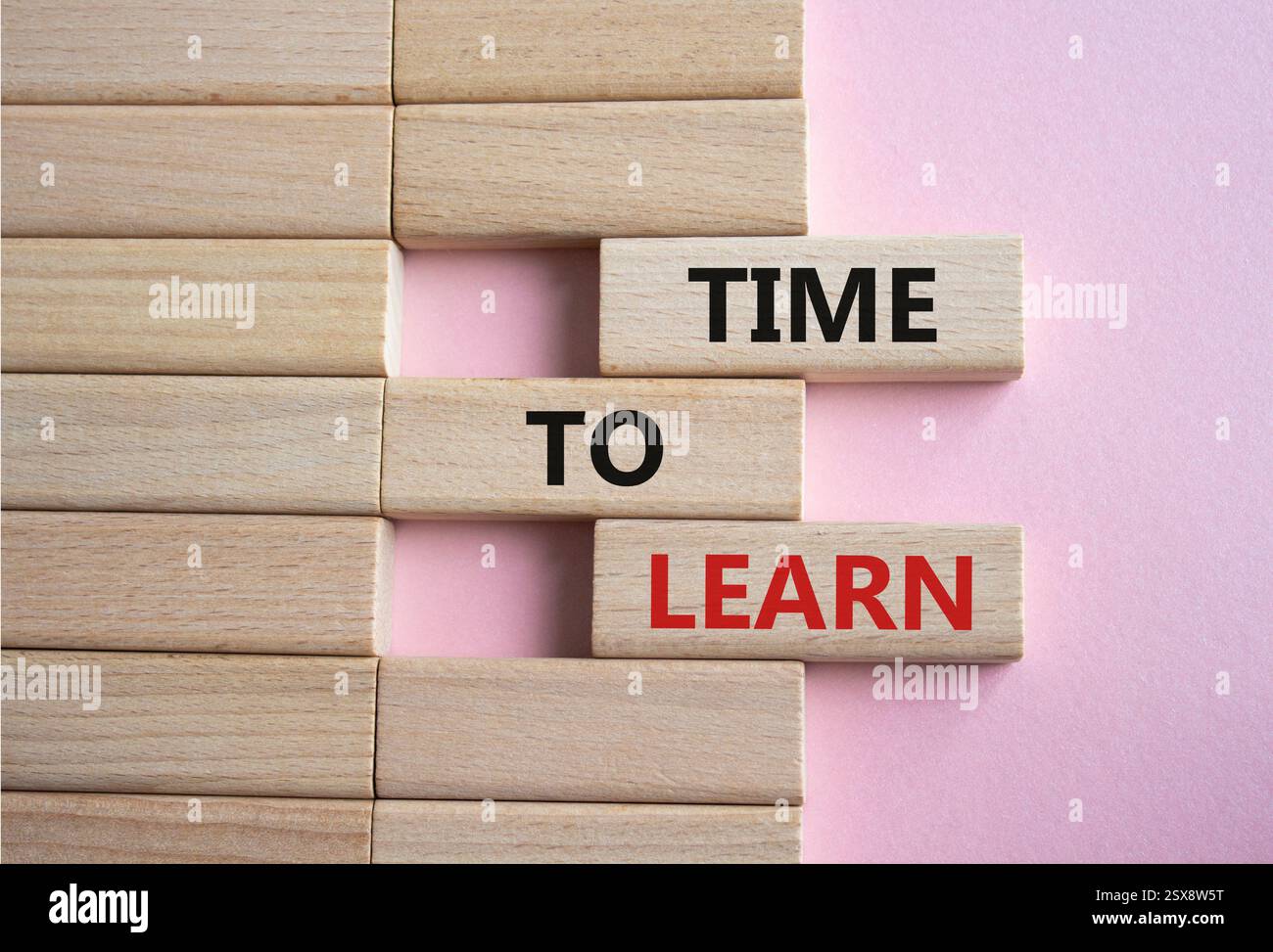 Time to learn symbol. Wooden blocks with words Time to learn. Beautiful ...