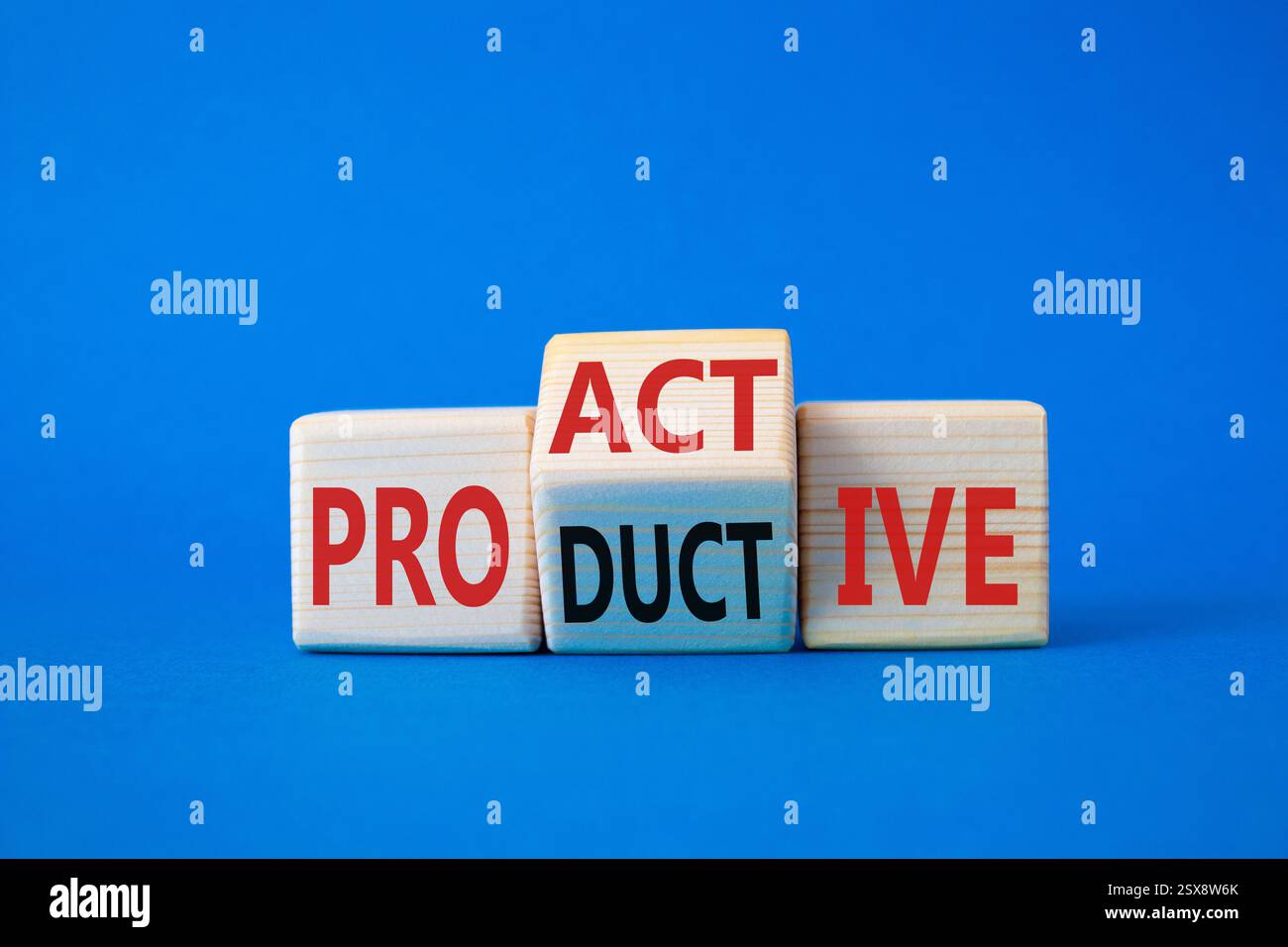 Proactive and Productive symbol. Wooden cubes with words Productive and ...