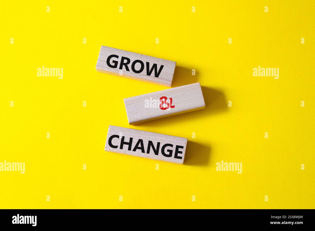 Grow and Change symbol. Concept word Grow and Change on wooden blocks ...