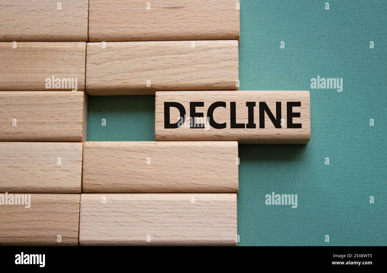Decline symbol. Concept word Decline on wooden blocks. Beautiful grey ...