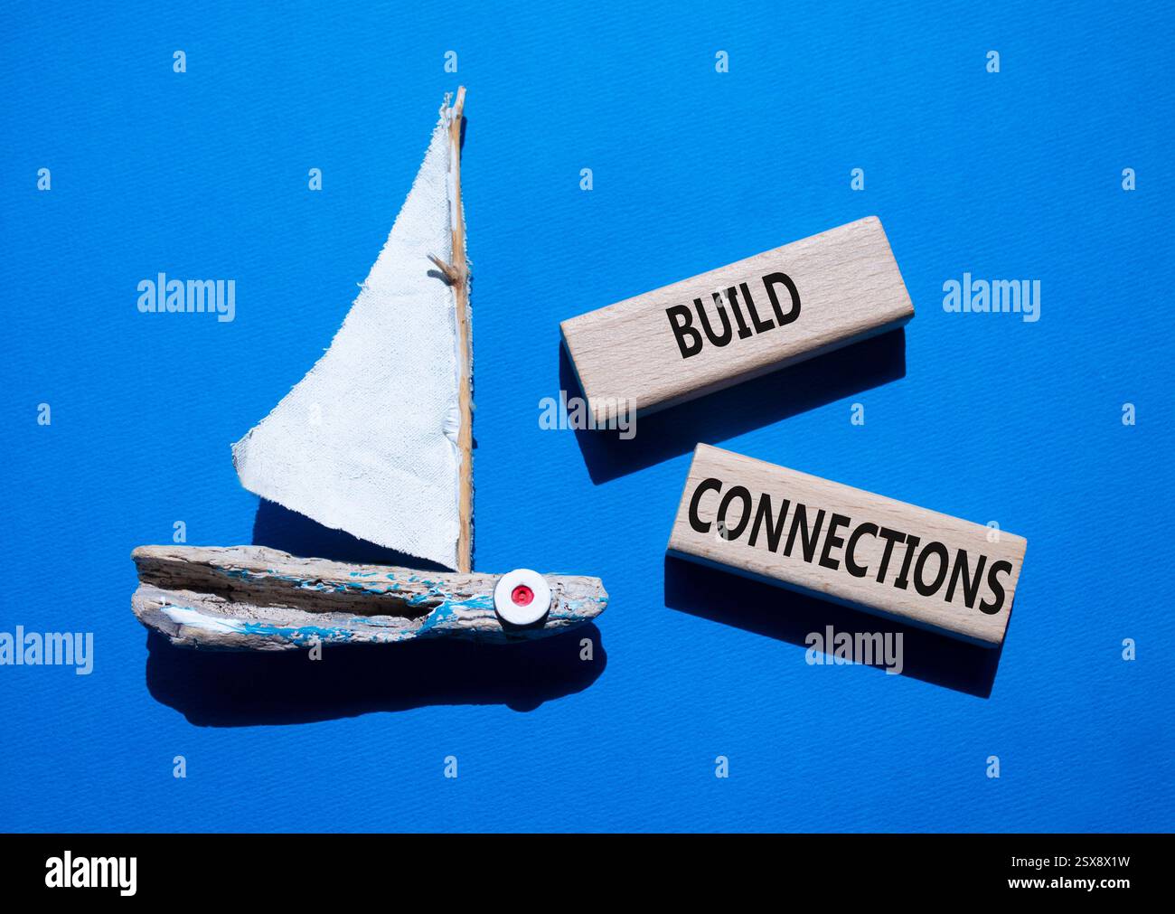 Build Connections symbol. Concept word Build Connections on wooden ...