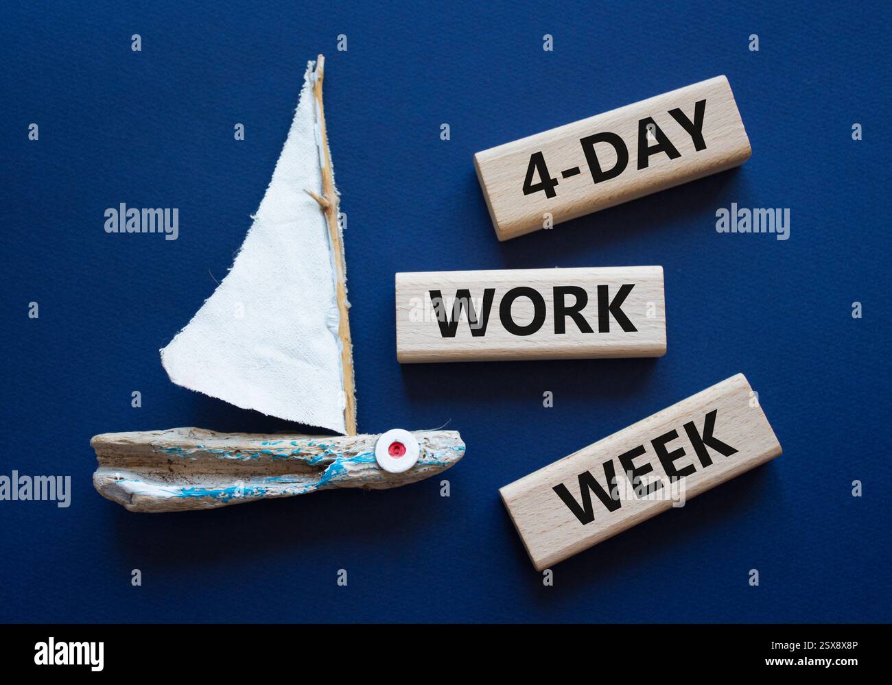 4-day work week symbol. Concept words 4-day work week on wooden blocks ...