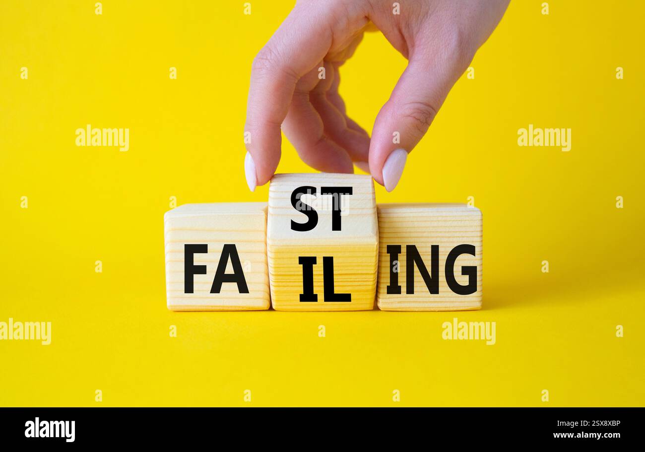 Fasting vs Failing symbol. Businessman hand turns wooden cubes and ...