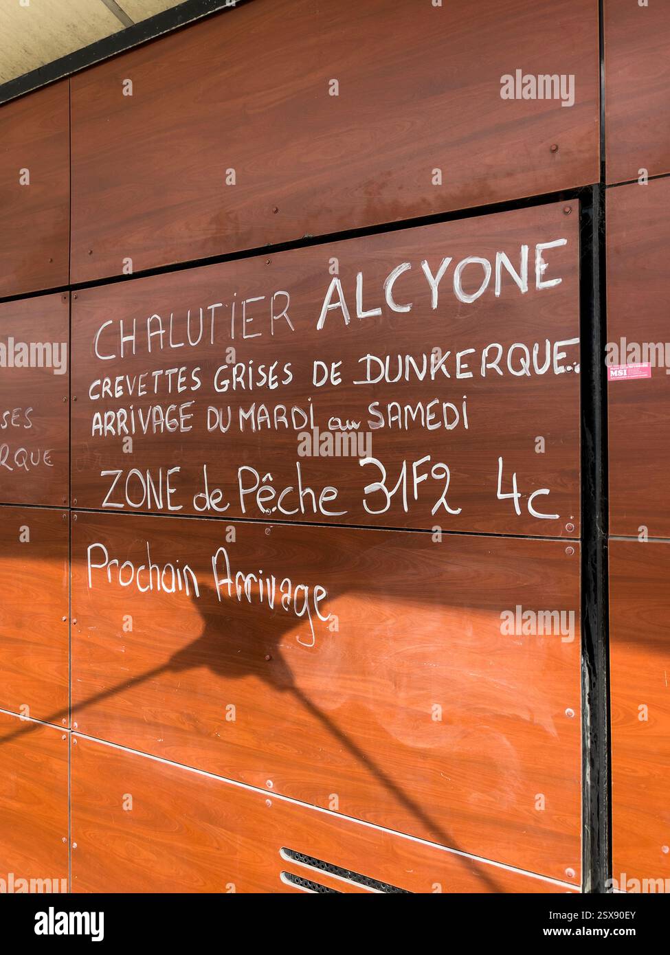 Advertising the incoming catch from the front of the fishing boat ...