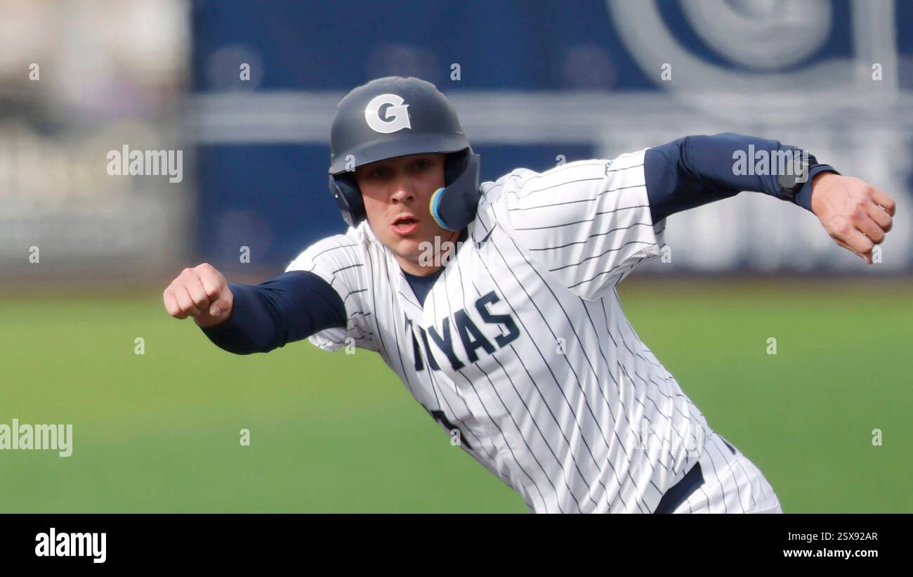 Georgetown catcher Connor Price (37) runs to third base during an NCAA ...