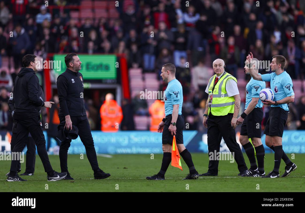 Bournemouth goalkeeping coach Neil Moss addresses officials at half ...