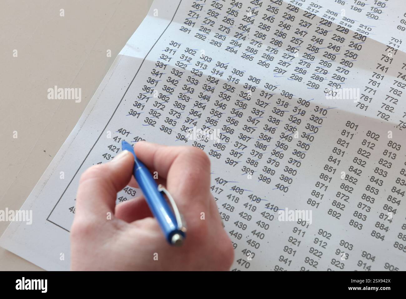 Wernigerode, Germany. 23rd Feb, 2025. An election worker notes the ...