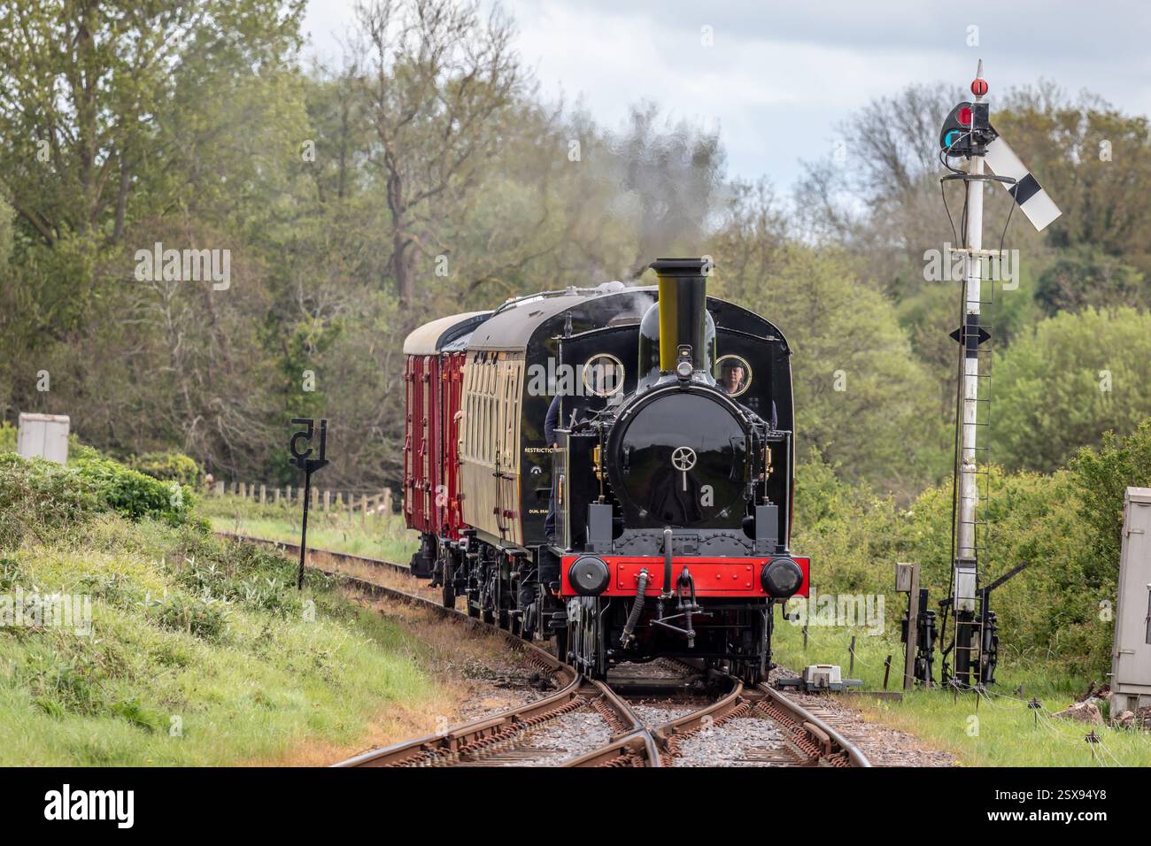LNWR 'Coal Tank' 0-6-2T No. 1054 approcches Williton station on the ...