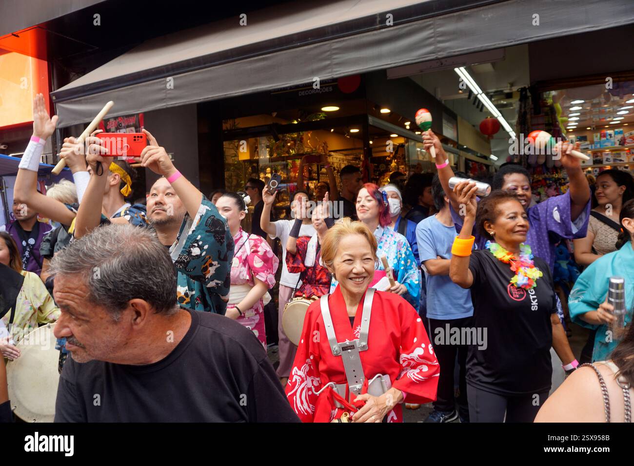 Revelers have fun at the pre-carnival street party in Sao Paulo, Brazil ...