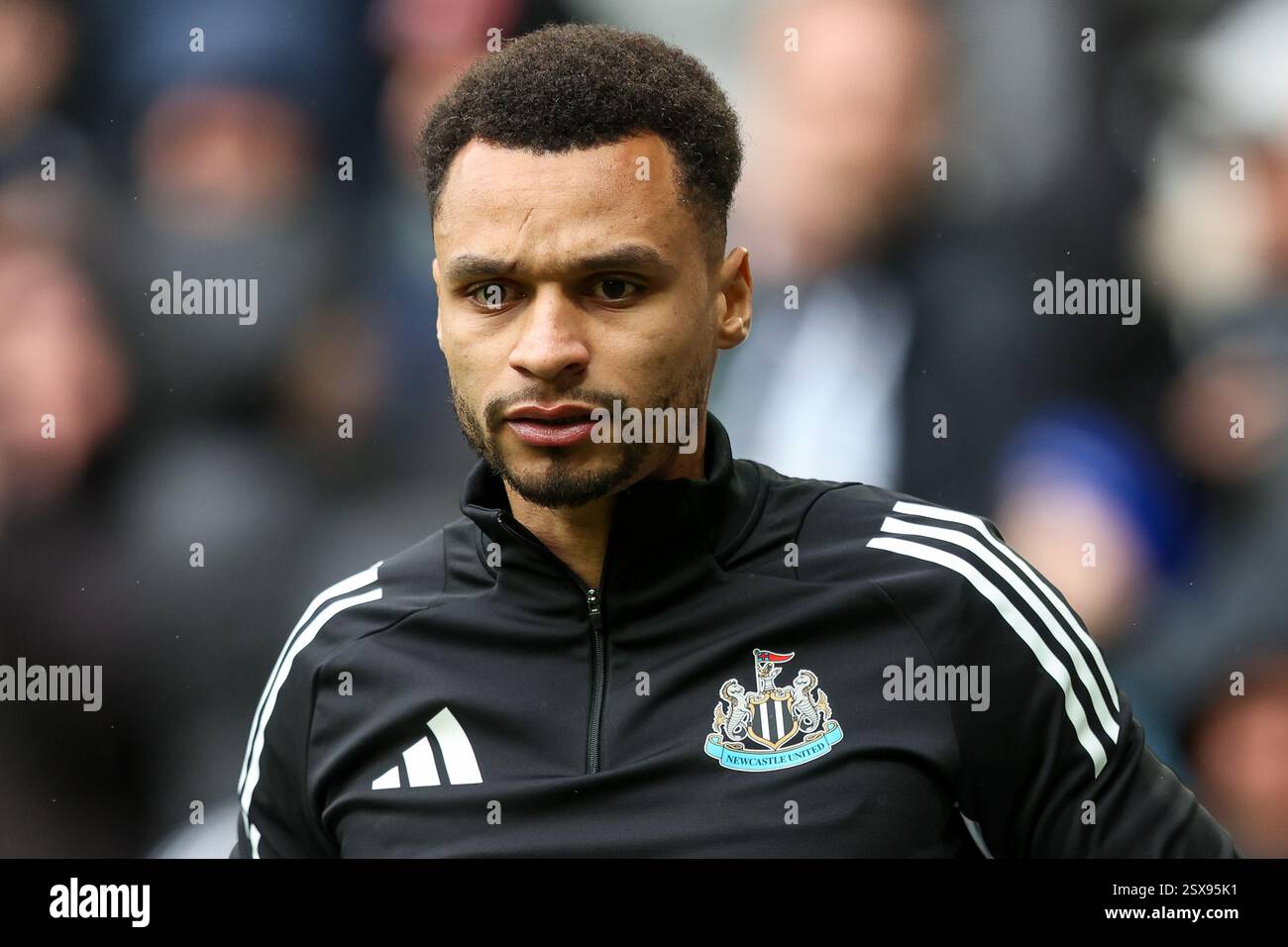 Newcastle, UK. 23rd Feb, 2025. Jacob Murphy of Newcastle United warms ...