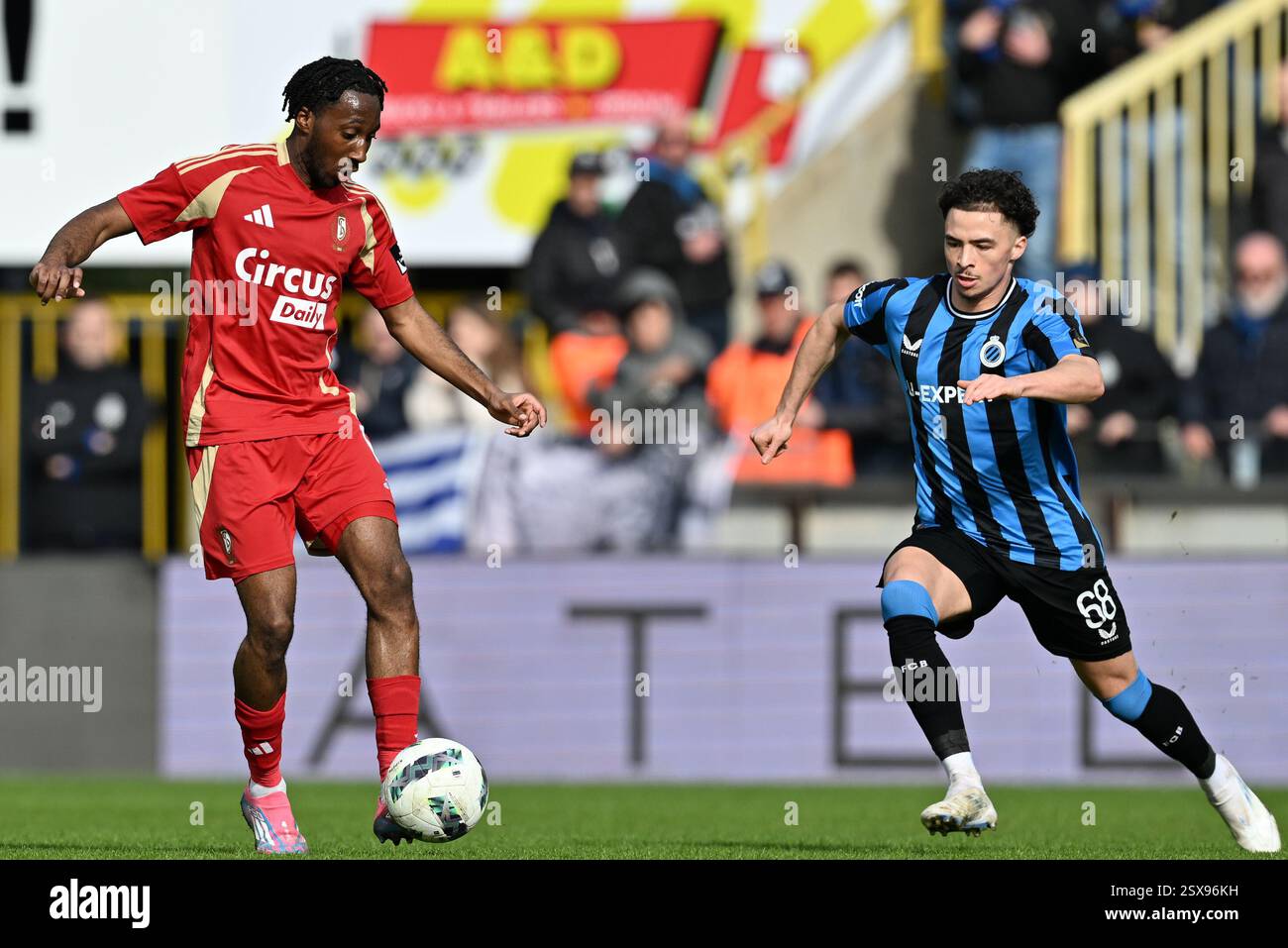 Leandre Kuavita (14) of Standard and Chemsdine Talbi (68) of Club ...