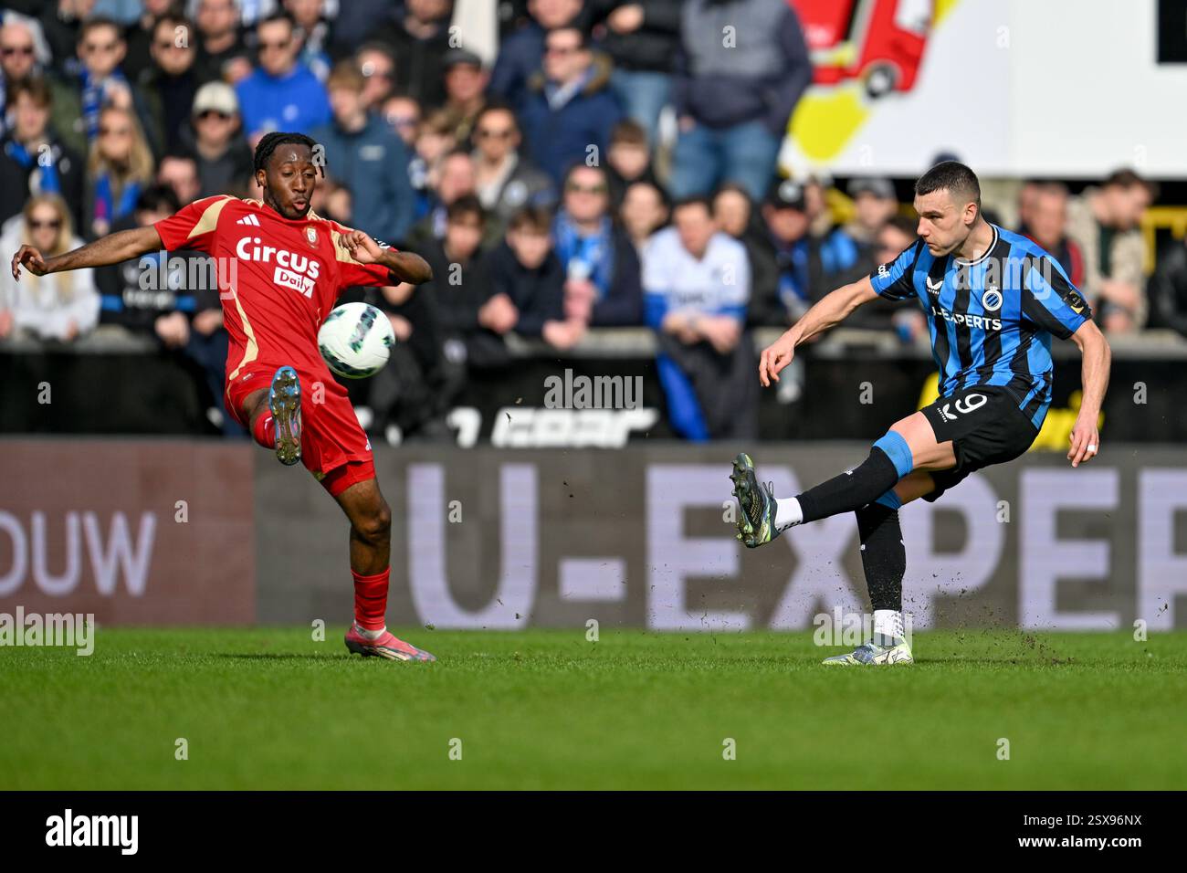Leandre Kuavita (14) of Standard defending on Ferran Jutgla (9) of Club ...