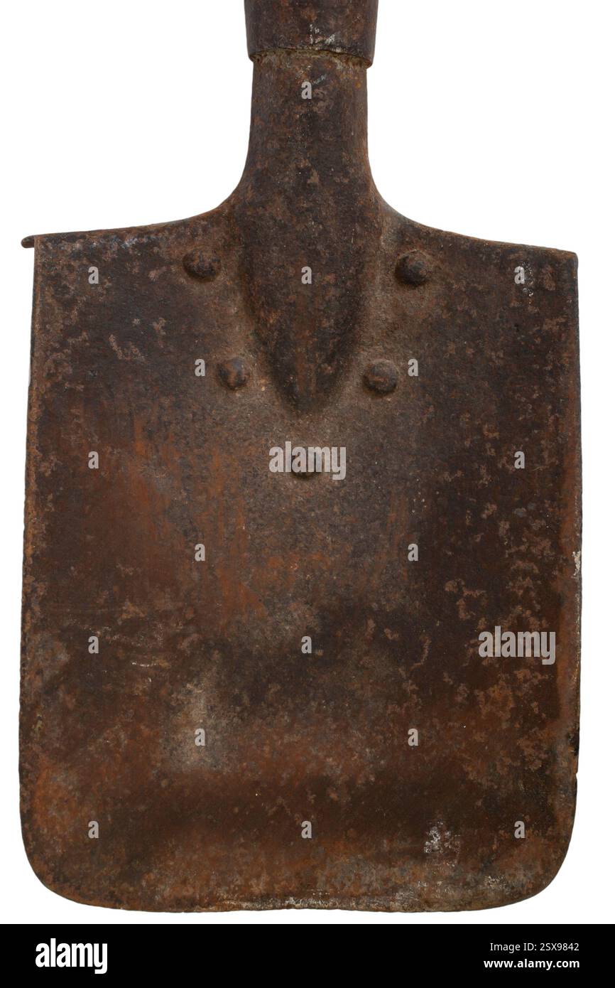 Short vintage military shovel with worn edges and rust pattern, detail ...