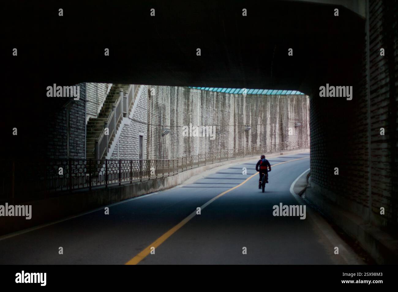 Daejeon, South Korea - November 12, 2020: A cyclist rides through a ...