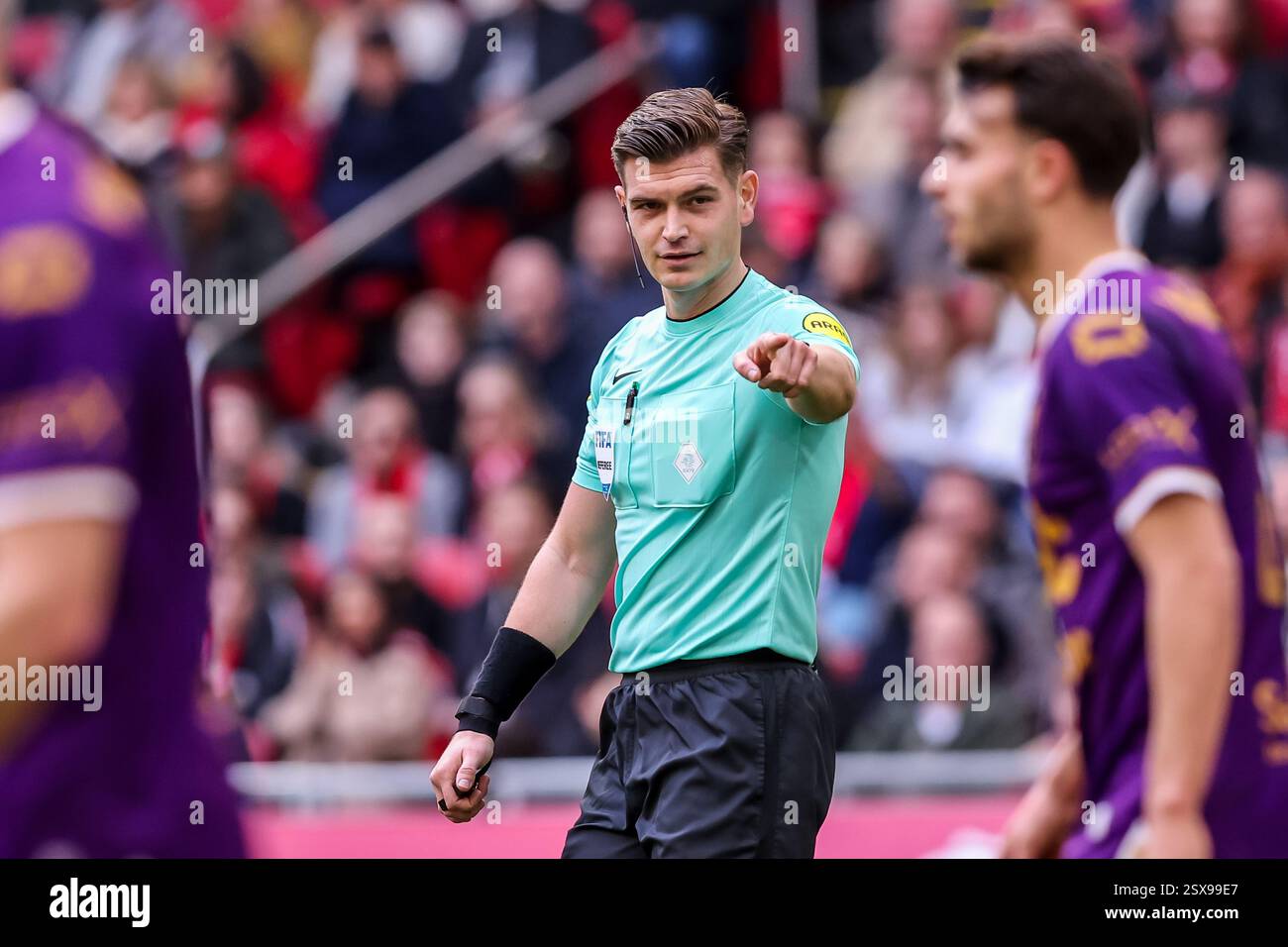 AMSTERDAM, NETHERLANDS - FEBRUARY 23: Referee Joey Kooij reacts during ...