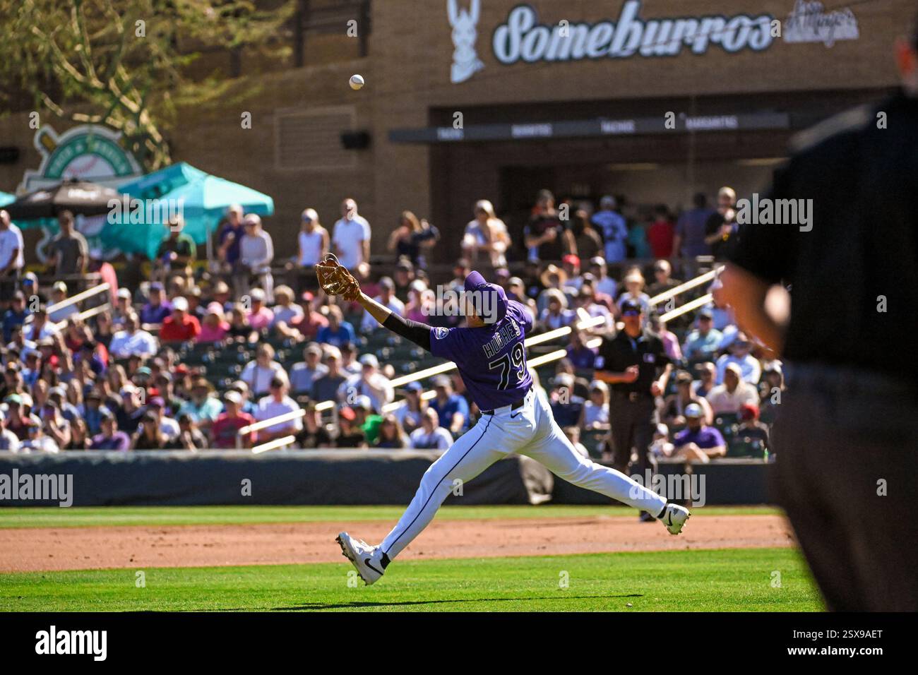Colorado Rockies pitcher Gabriel Hughes (79) catches a fly ball in the ...