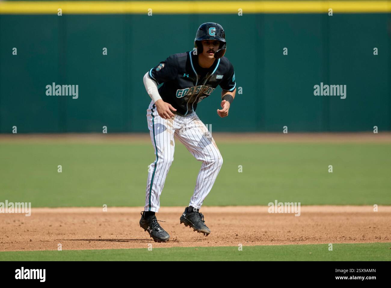 Coastal Carolina Chanticleers Dean Mihos (8) leads off second base ...