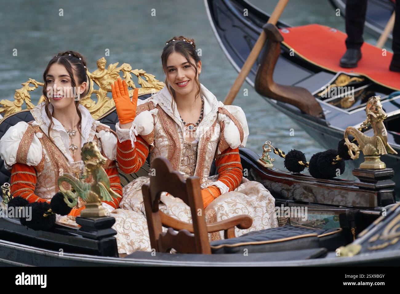 Venice, Italy. 22nd Feb, 2025. The young Maries of the Carnival greet ...