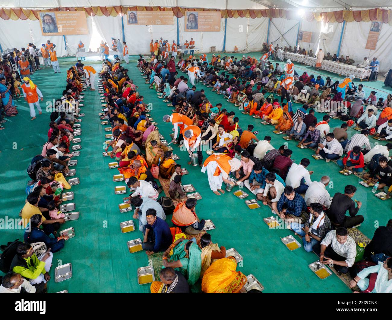Hindu devotees participate in a community feast held by Vishav Manav ...